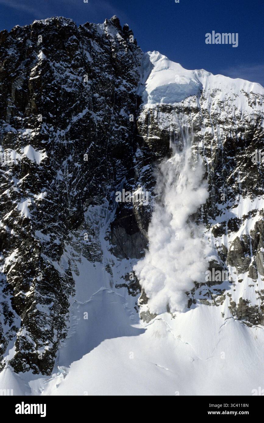 Avalanche falling down Mount Neacola, Lake Clark National Park, Alaska ...
