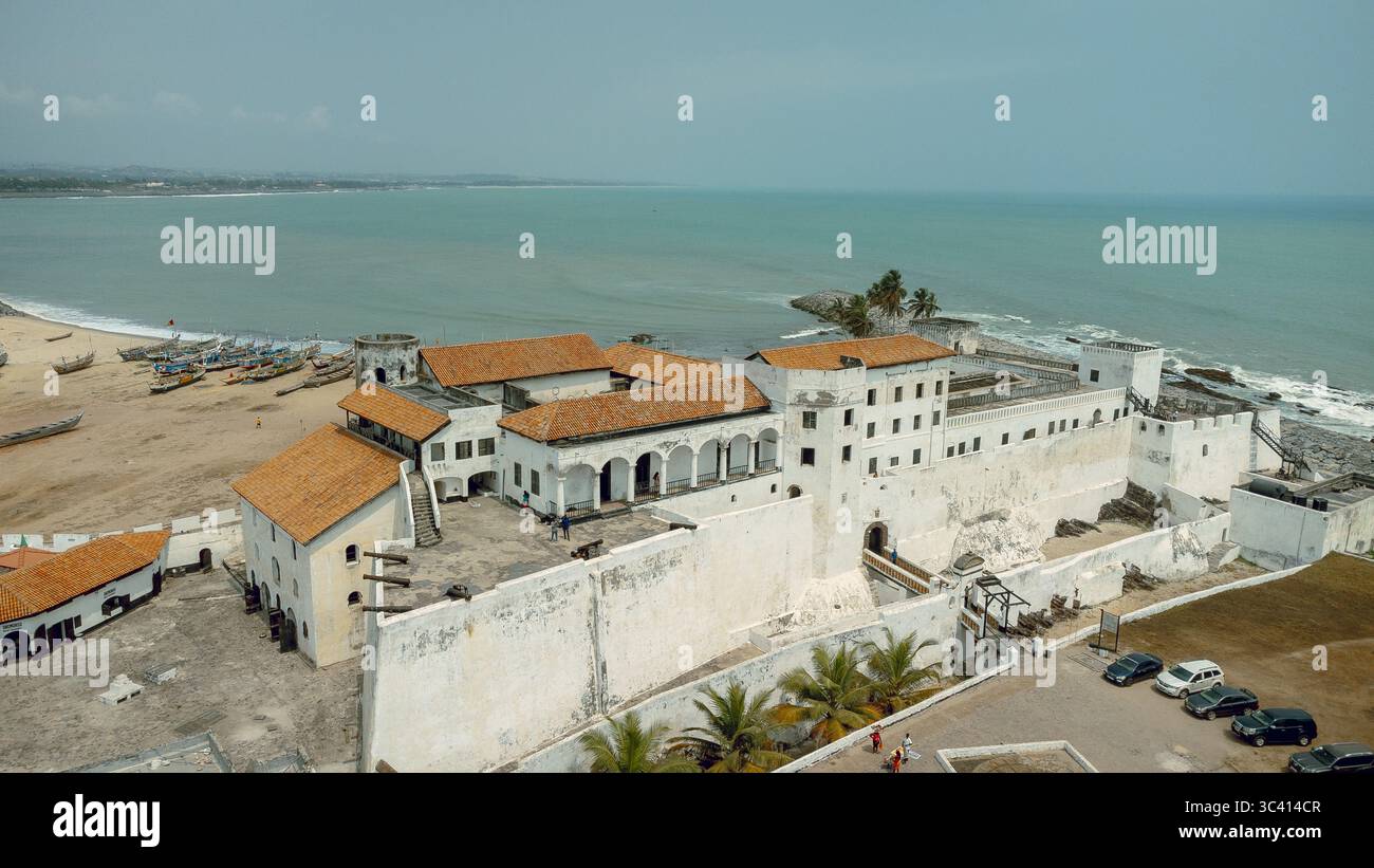 Aerial view of the imposing Cape Coast Castle, its white walls ...