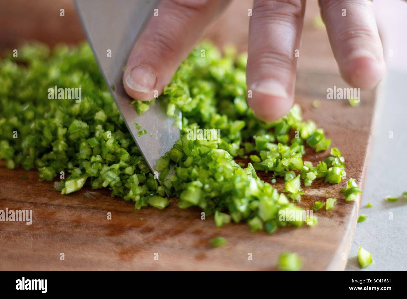 Cook knife cutting garlic hi-res stock photography and images - Alamy