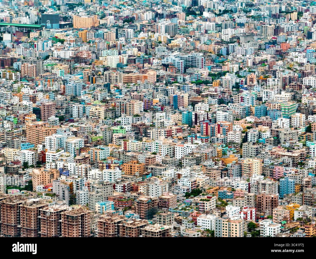 Aerial view of a dense cityscape with tightly packed buildings ...