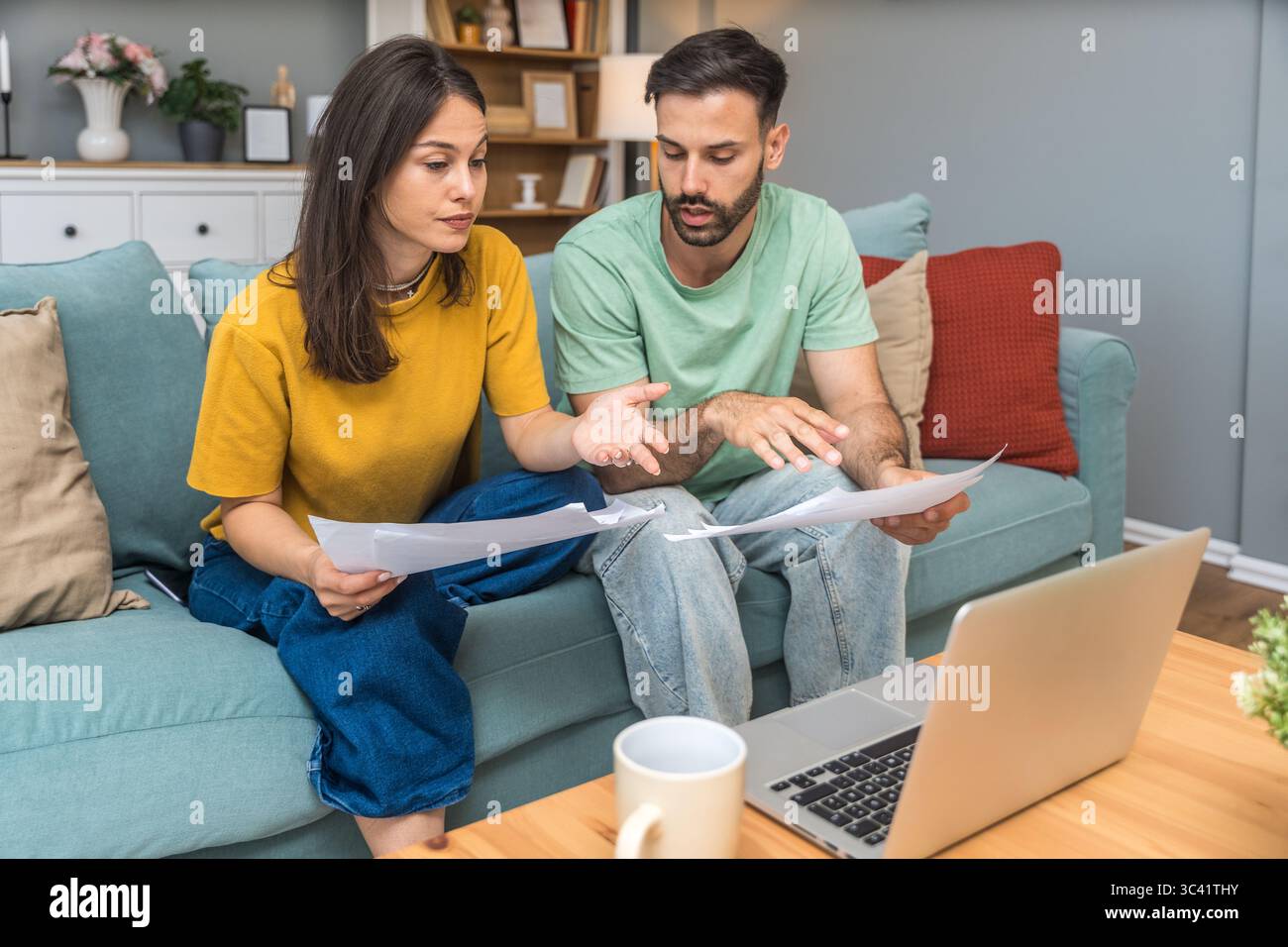 Doing Accounting at Home: Happy Couple Using Laptop Computer, Sitting ...