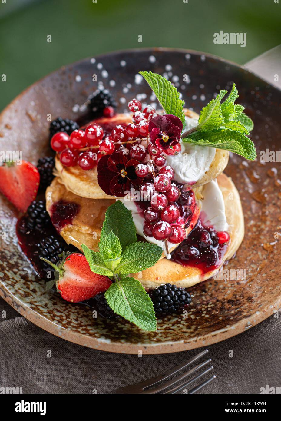 Stack pancakes topped fresh fruits hi-res stock photography and images ...