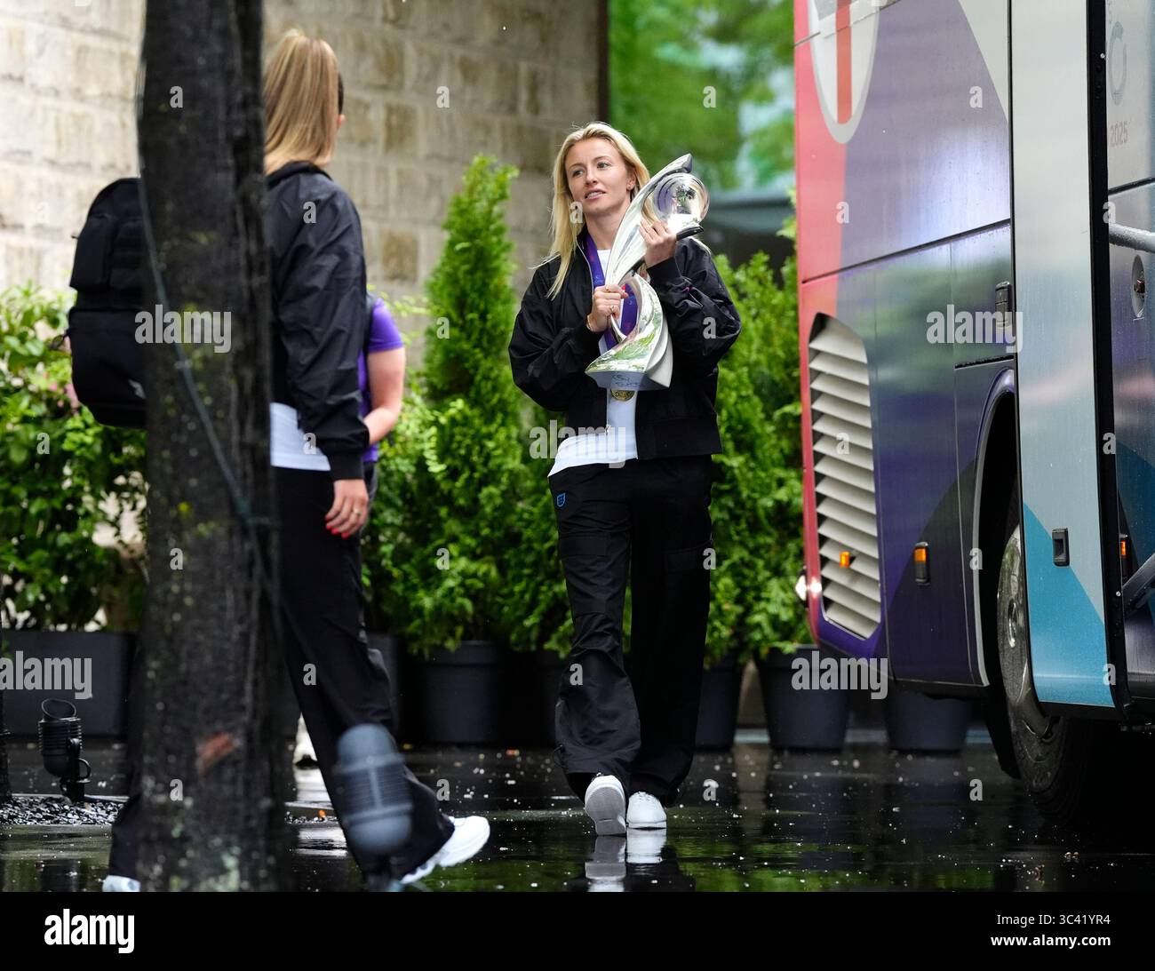 England captain Leah Williamson (right) with the trophy leaving the ...