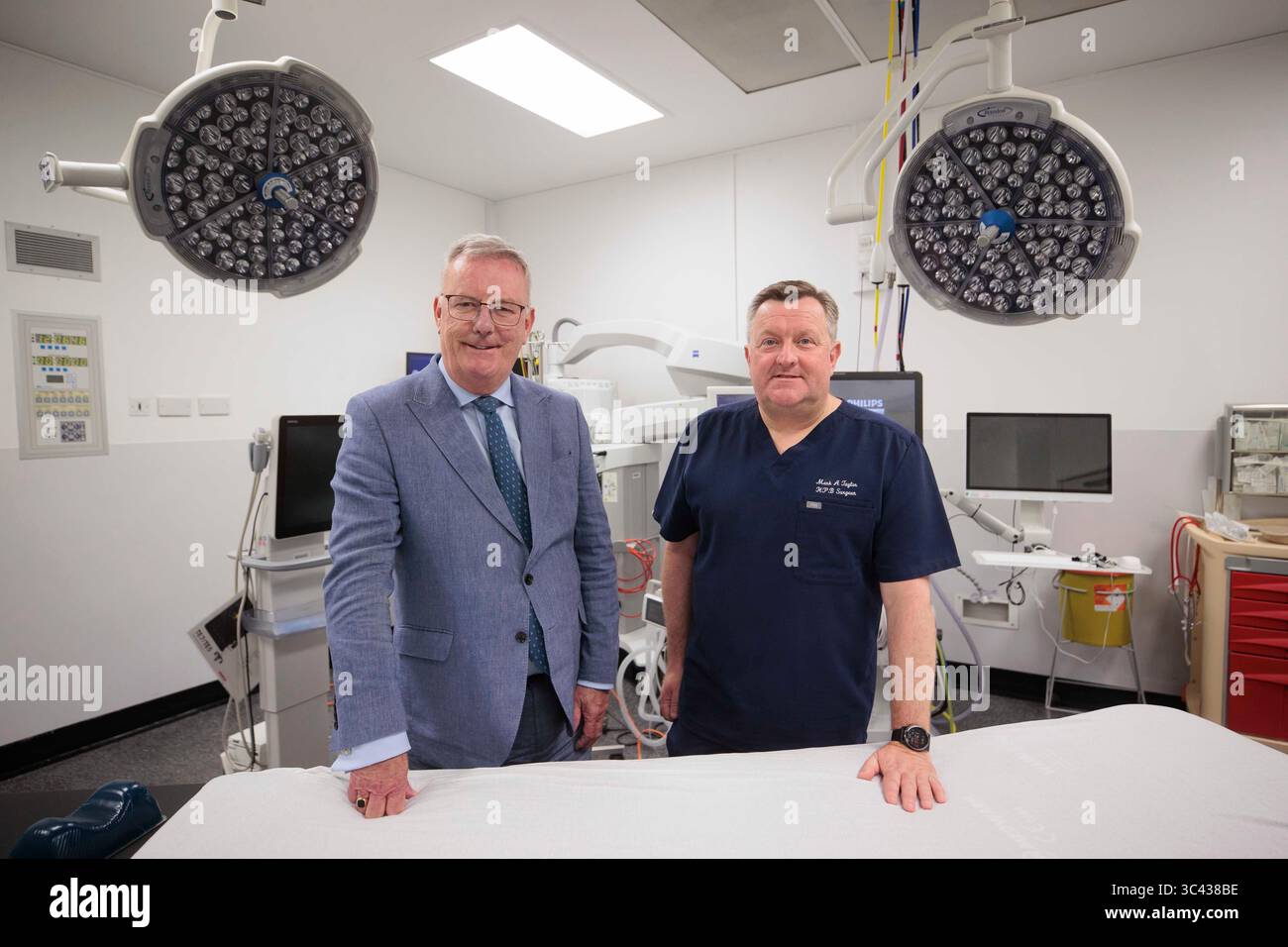 Health Minister Mike Nesbitt (left) at the Mater Hospital in Belfast ...