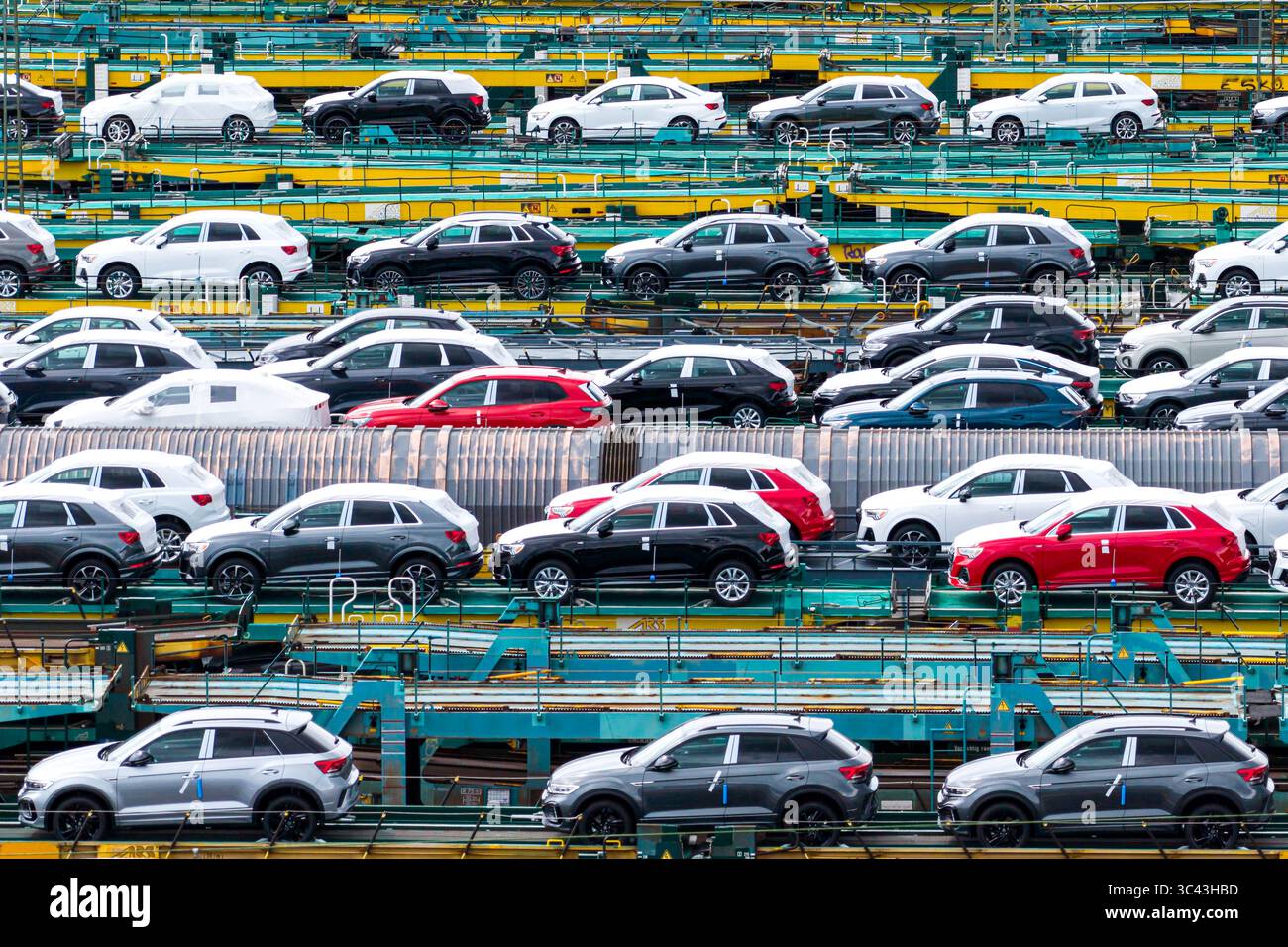 28 July 2025, Bremen: Car trains are parked at the marshalling yard in ...