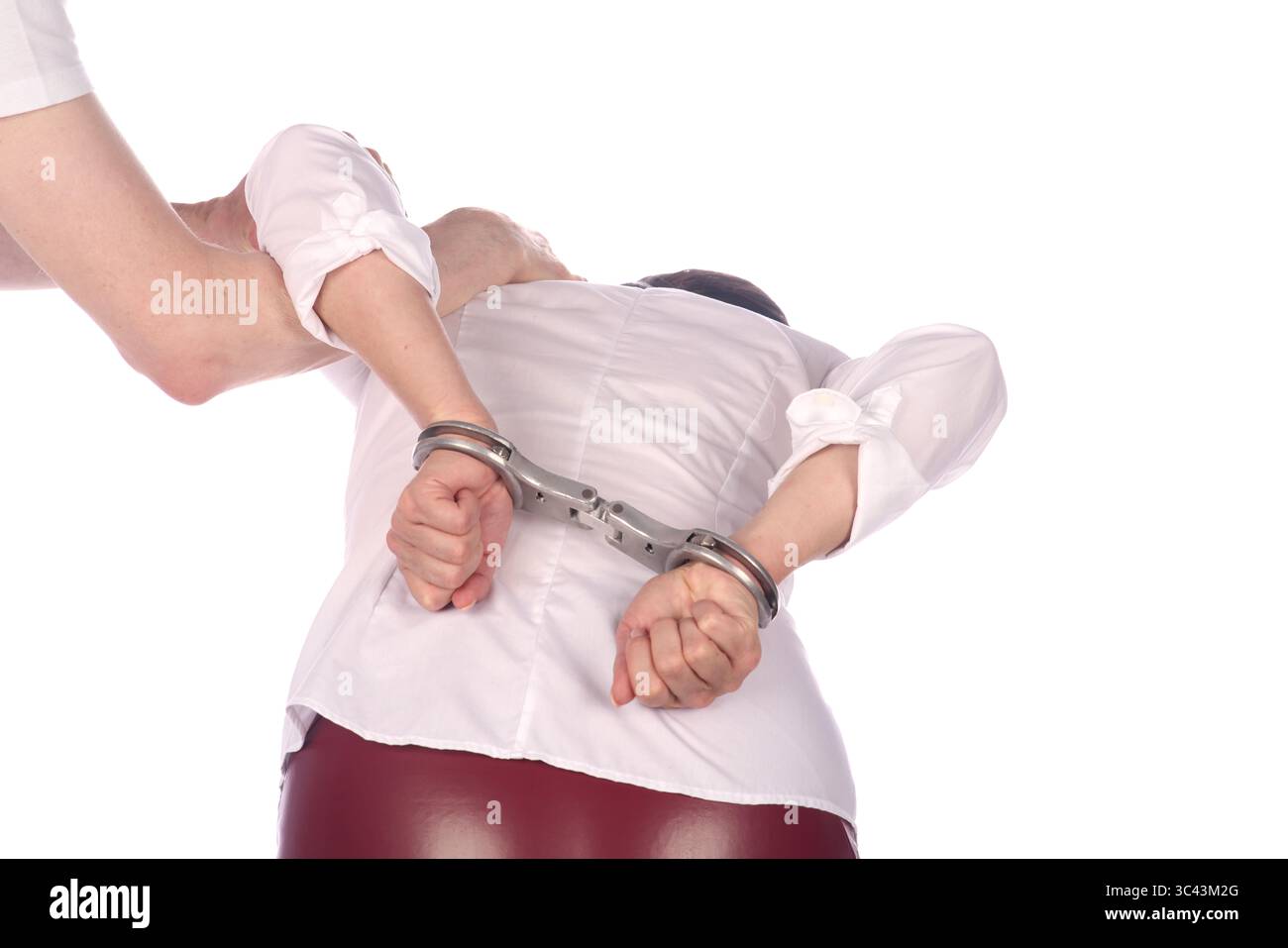 Woman arrested in GDR handcuffs, hands behind, police grip Stock Photo ...