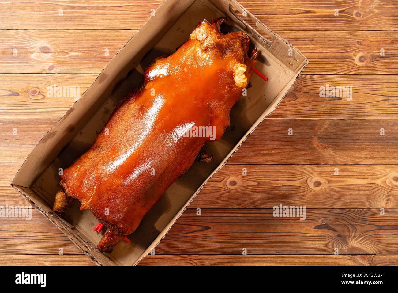 top view roasted whole pig at horizontal composition Stock Photo - Alamy
