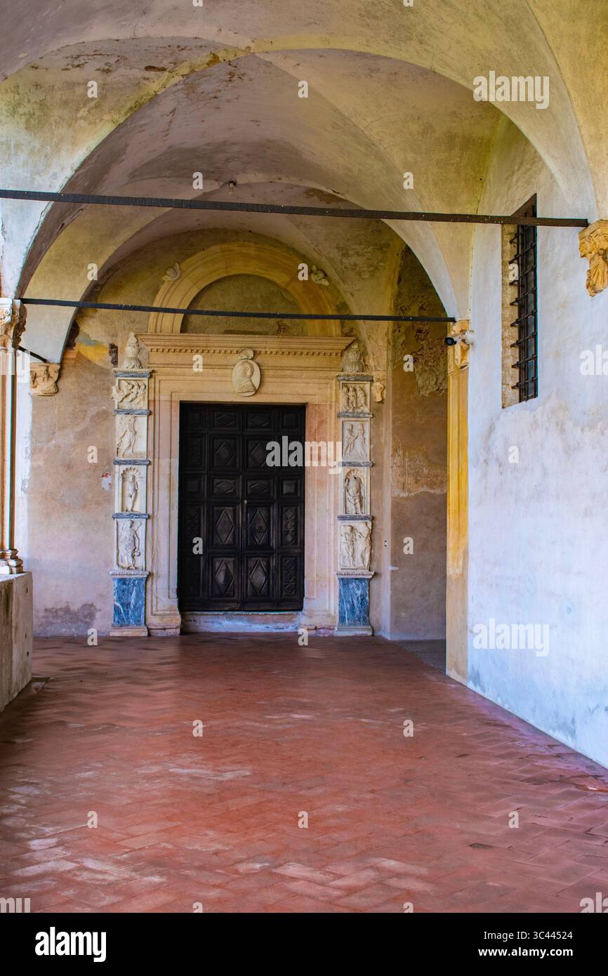 Italy: arches and details of frescoed cloisters near the monks cells in ...