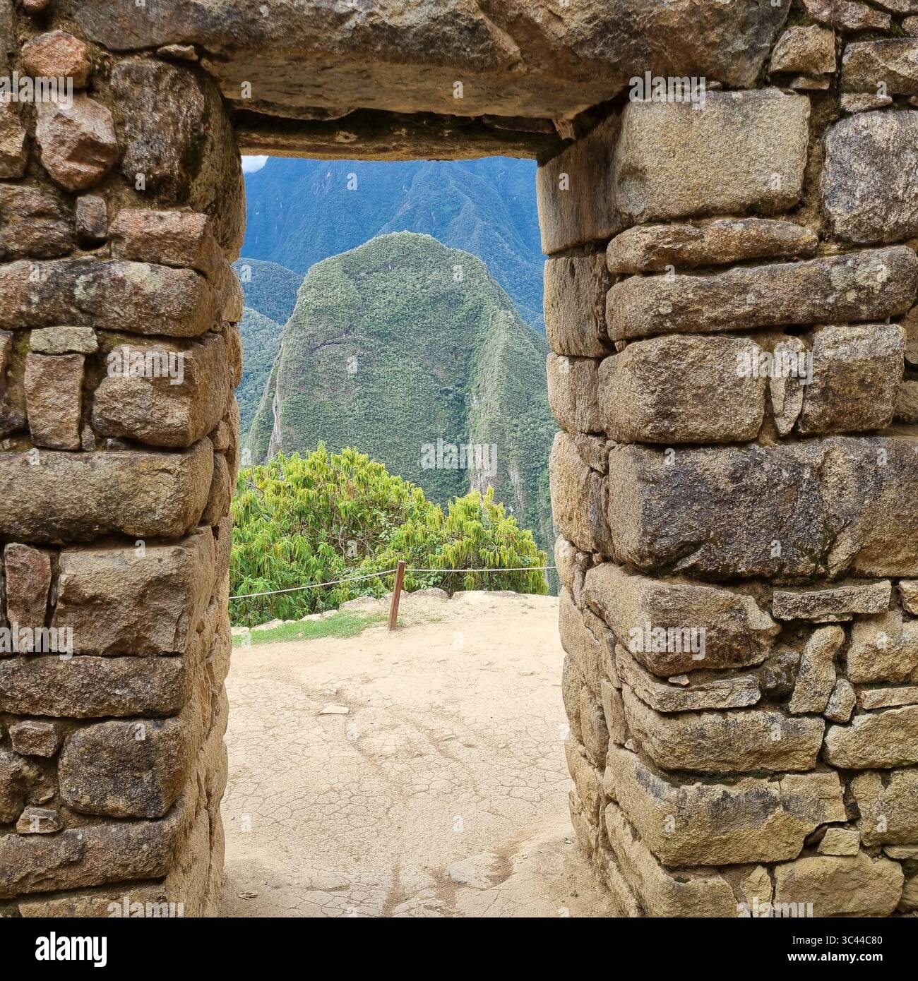 Mountain View through the Ancient Inca Stonework of Machu Picchu Stock ...