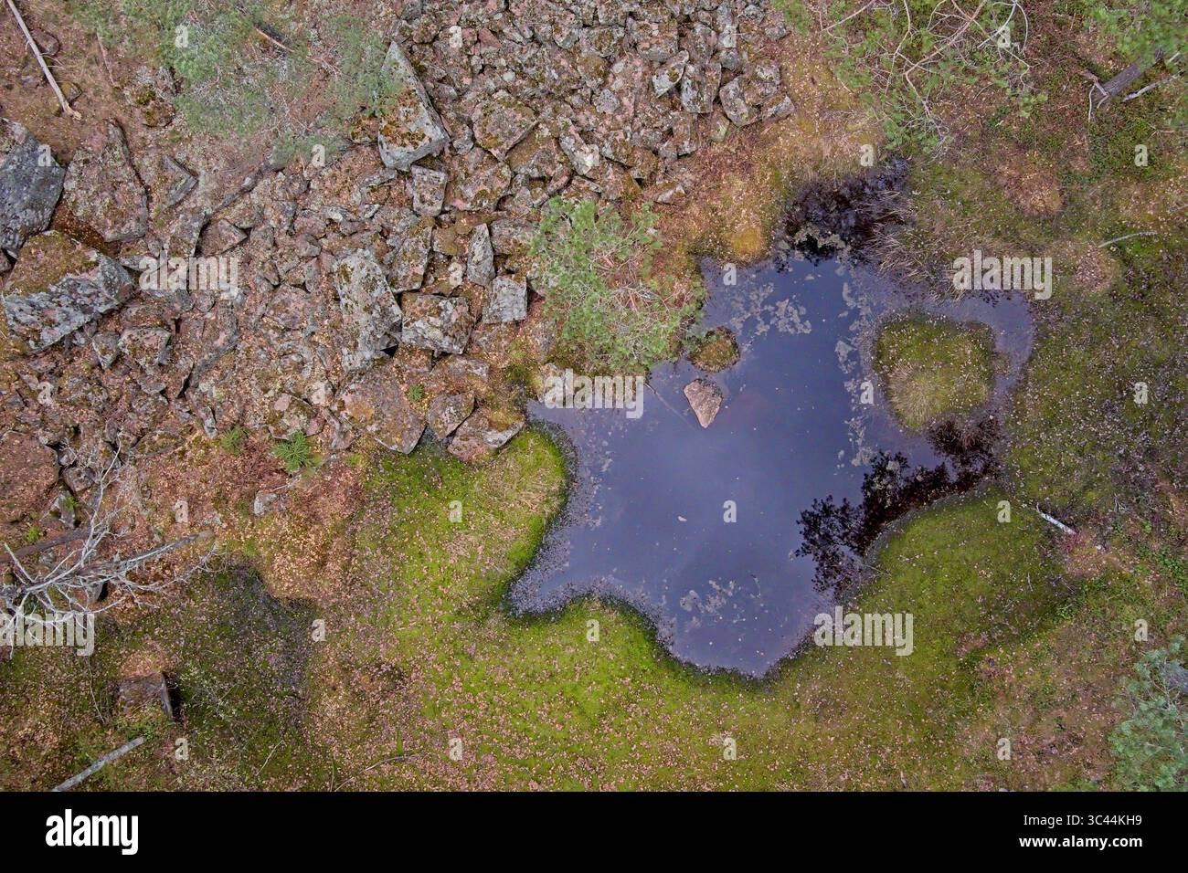Aerial view of historical Hevonniemi quarry of Pyterlahti, where red ...