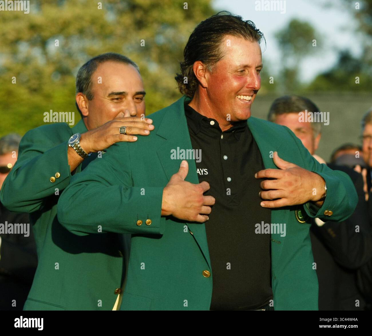 April 11, 2010, Augusta, GA, USA: Phil Mickelson receives his green ...