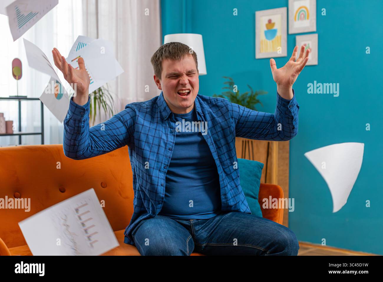 Irritated man throw document papers hi-res stock photography and images ...