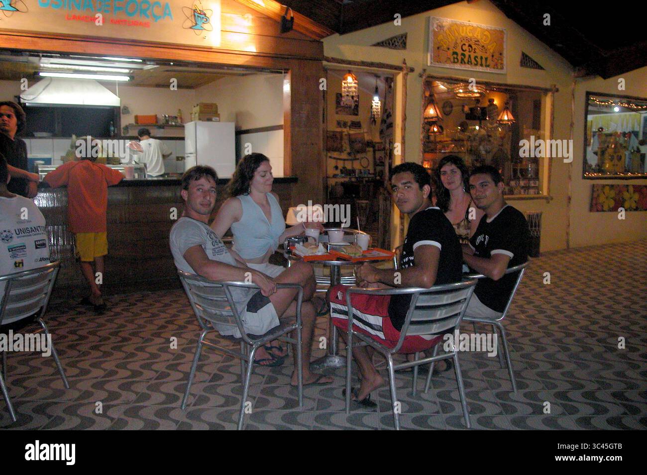 Group people sitting eating restaurant hi-res stock photography and ...