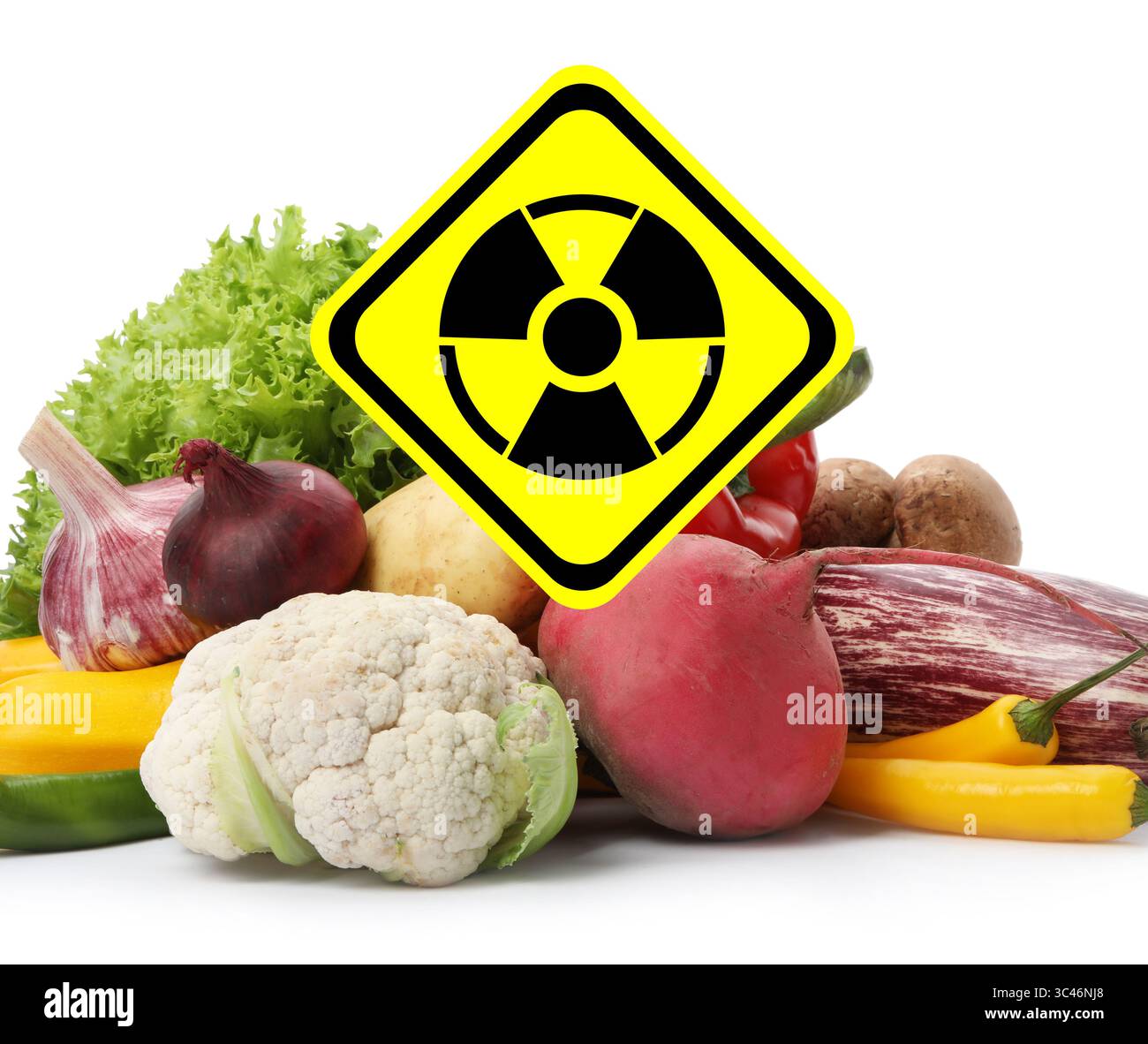 Fresh vegetables and radioactive sign on white background ...