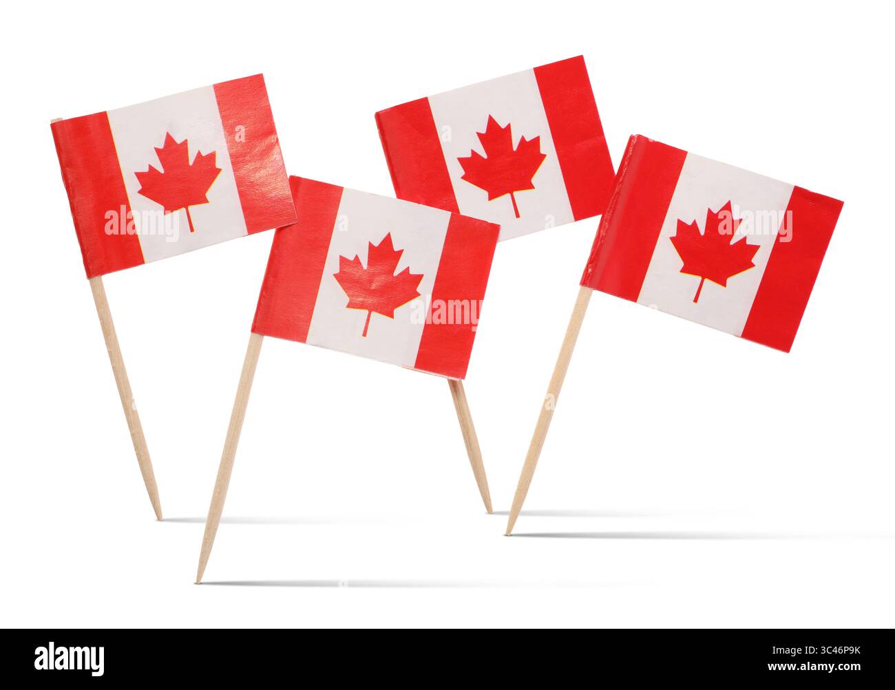 Small paper flags of Canada on white background Stock Photo - Alamy