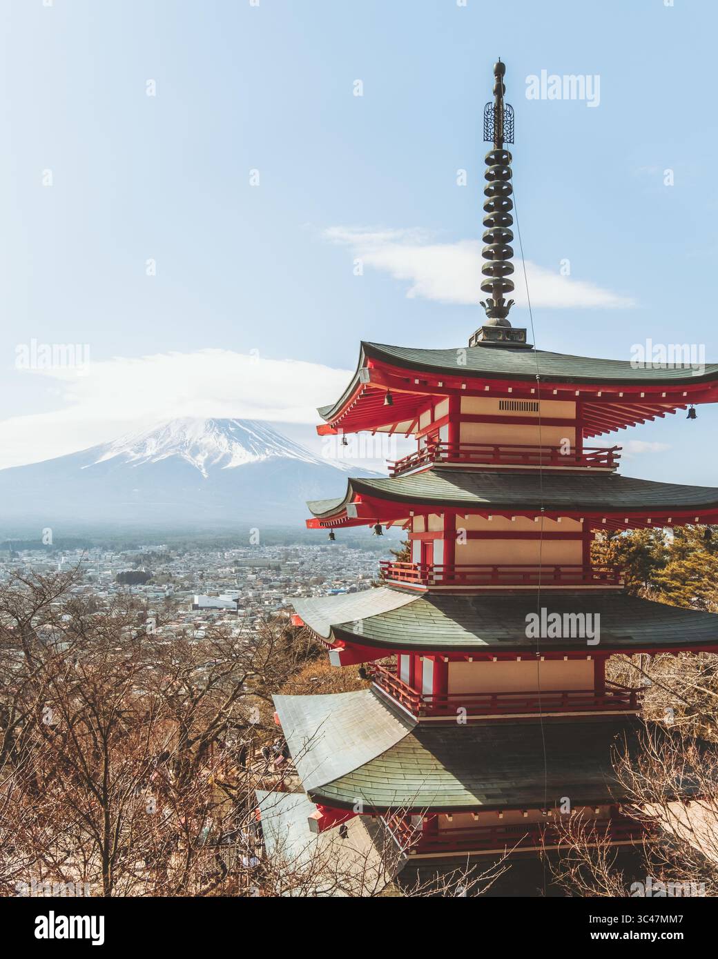 View of the vibrant red Chureito Pagoda stands tall against the ...