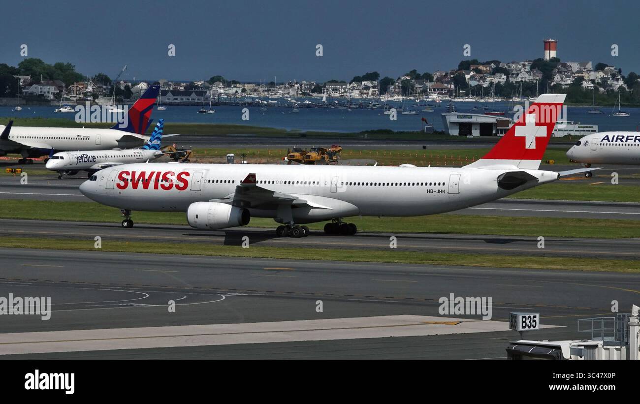 Swiss air flight arrives logan international airport hi-res stock ...