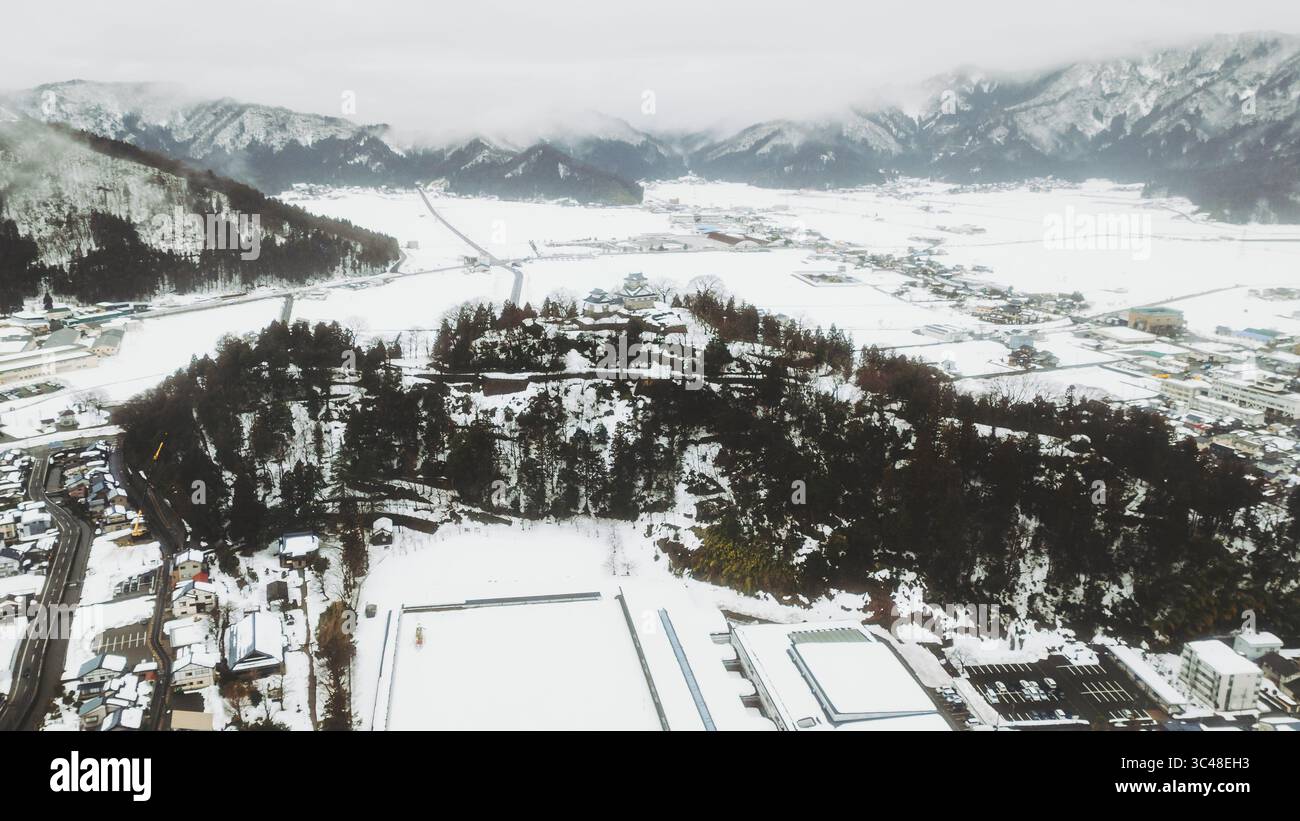 Aerial view of Echizen Ono Castle standing proudly amidst a snow ...