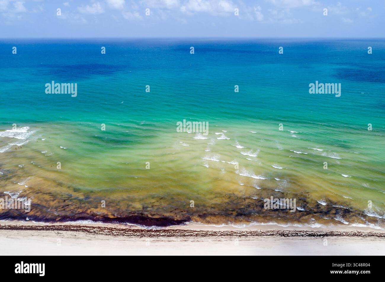 Small breaking waves near shallow surf zone hi-res stock photography ...