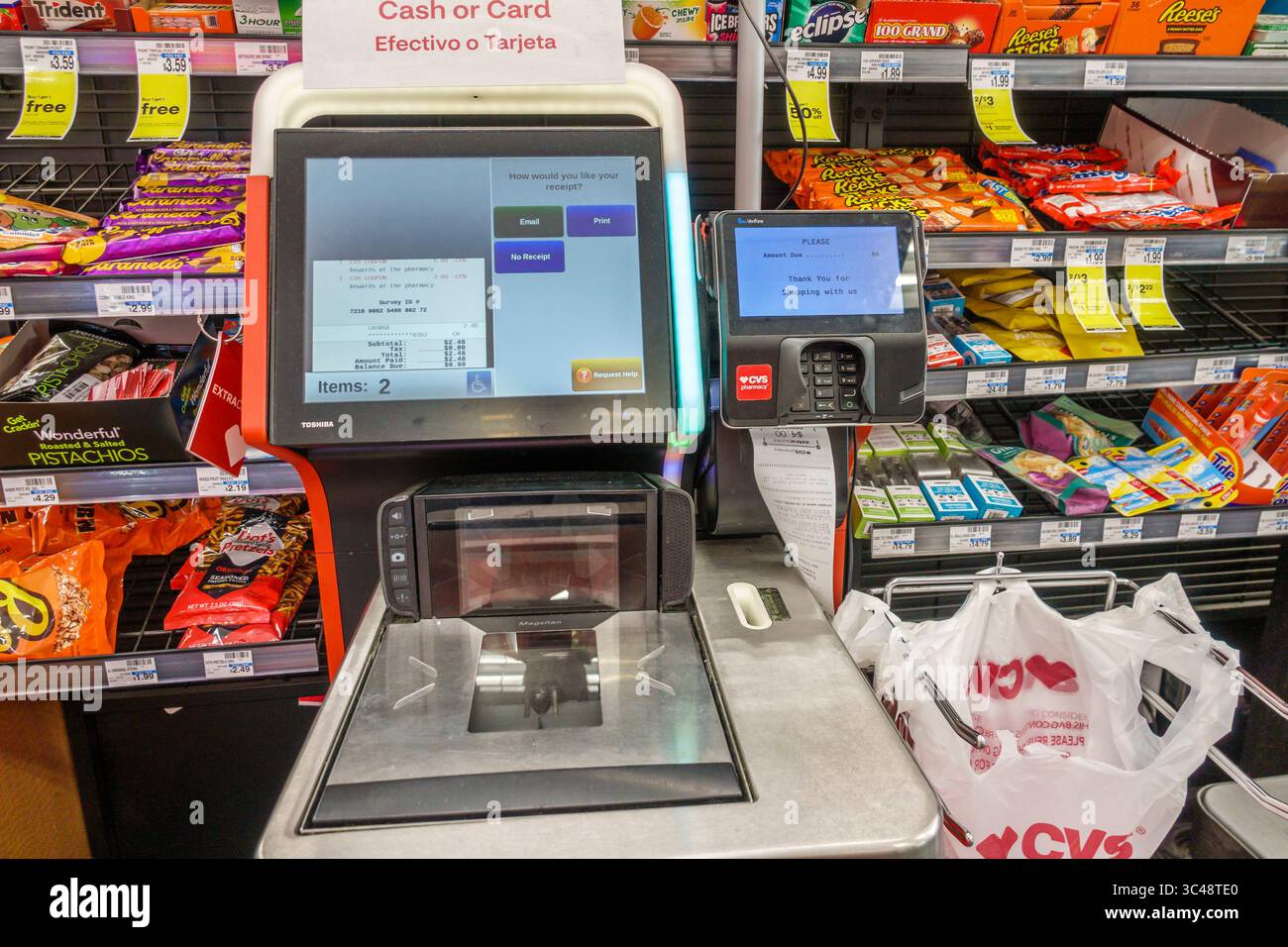 Self checkout station with touchscreen interface and card reader hi-res stock photography and ...