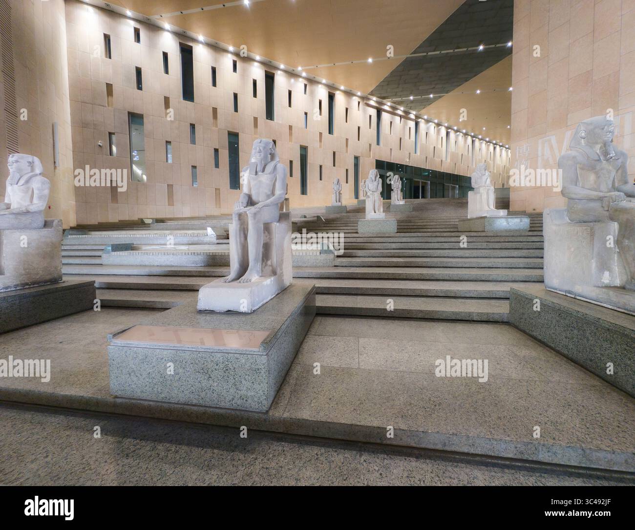 Egypt, Cairo, Grand Egyptian Museum (GEM), stairs with statues of king ...