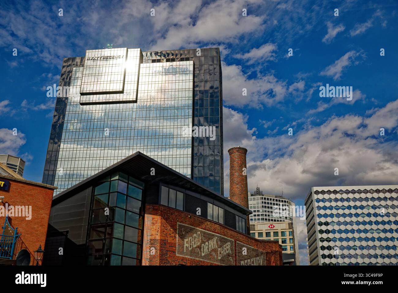 A collection of old and new buildings creating the urban skyline around ...
