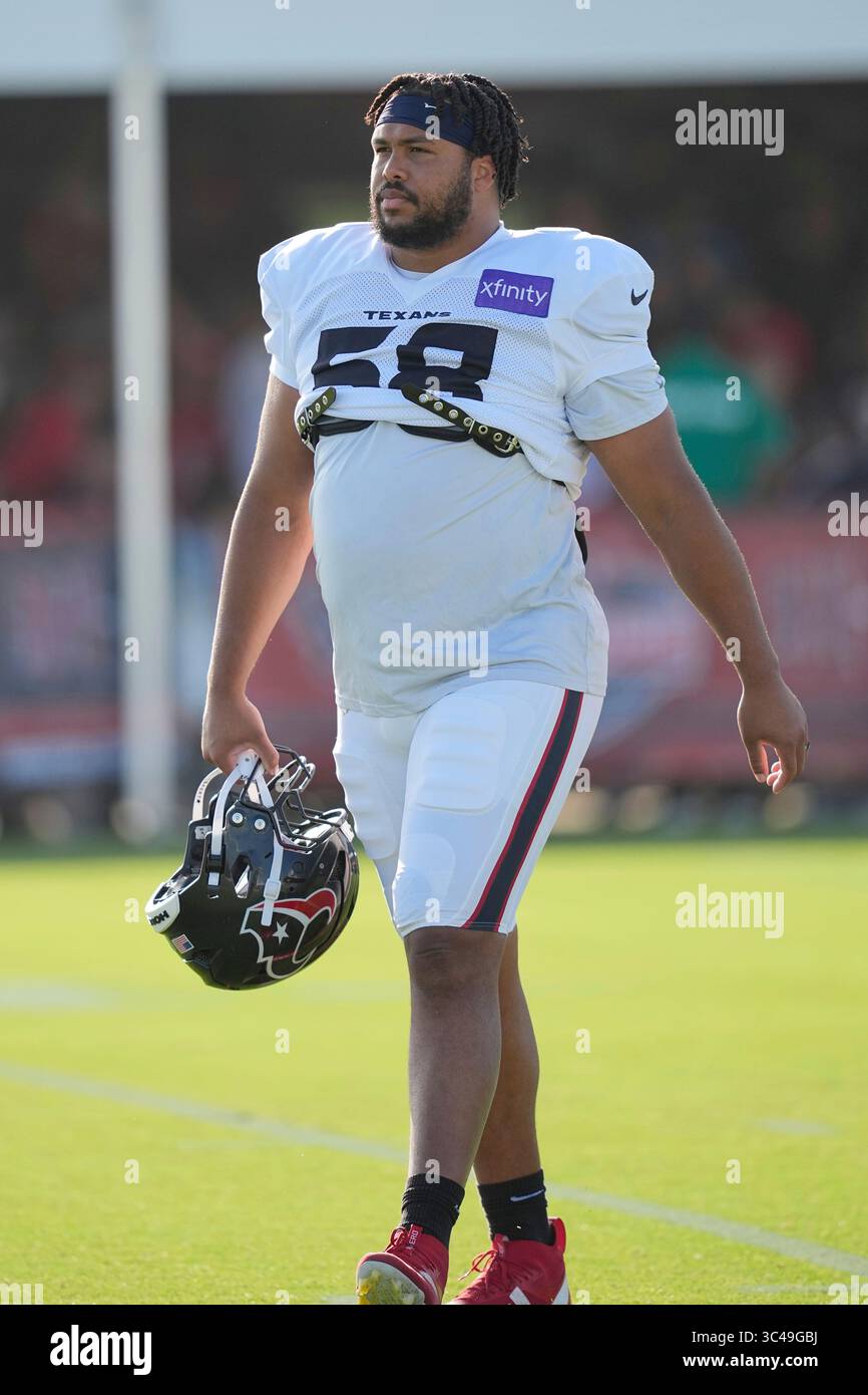 Houston Texans defensive tackle Kyonte Hamilton walks across the field ...