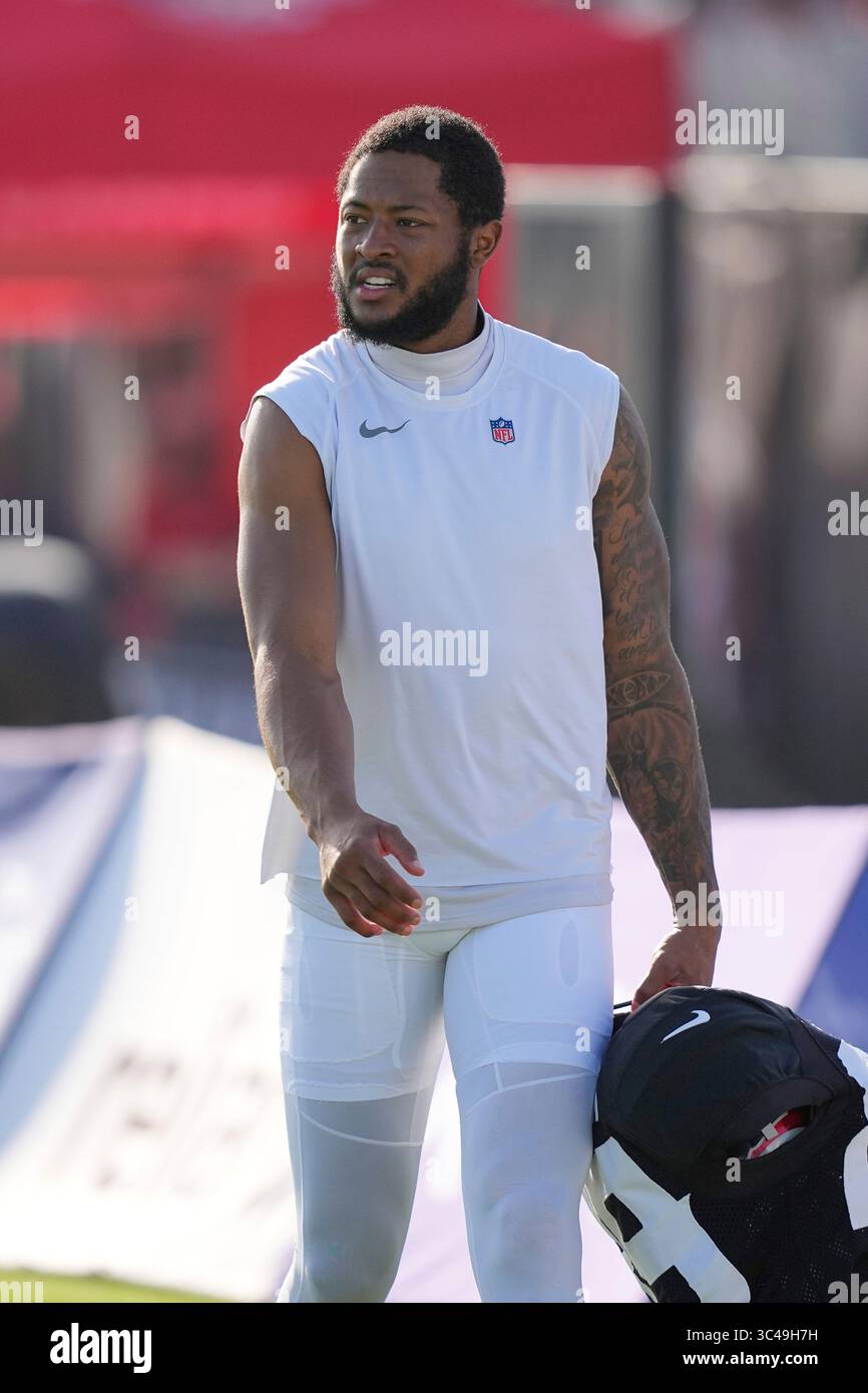 Houston Texans wide receiver Xavier Johnson walks across the field ...