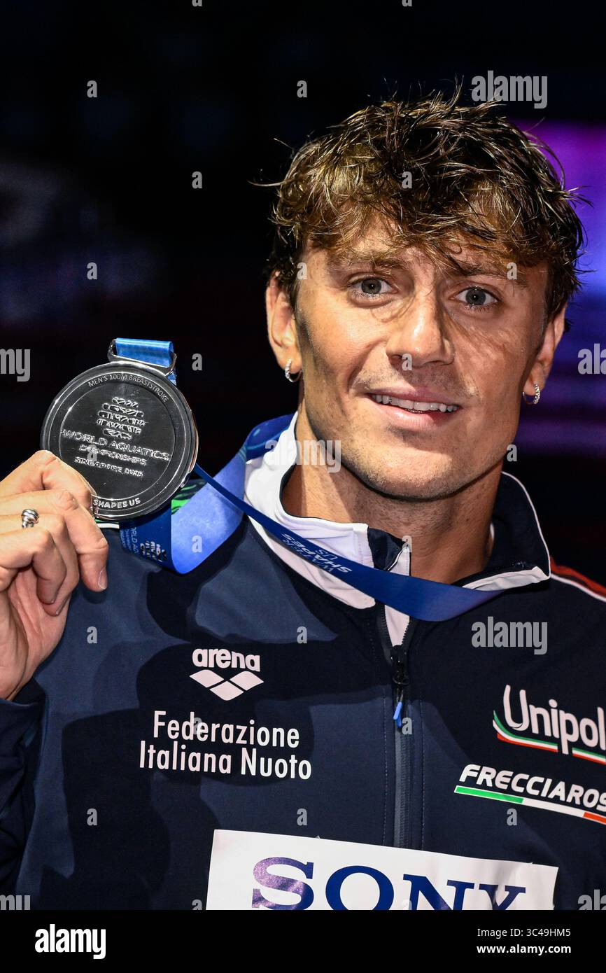 Nicolo’ Martinenghi of Italy stands with the silver medal after ...