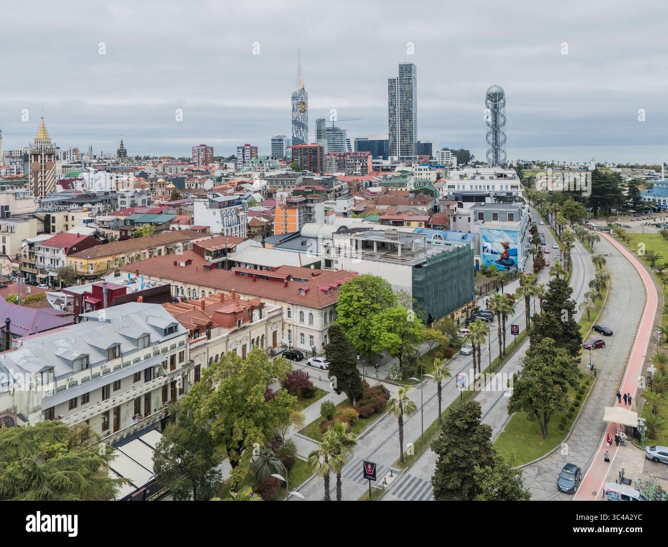 Aerial view of modern skyscrapers piercing the skyline beyond the red ...