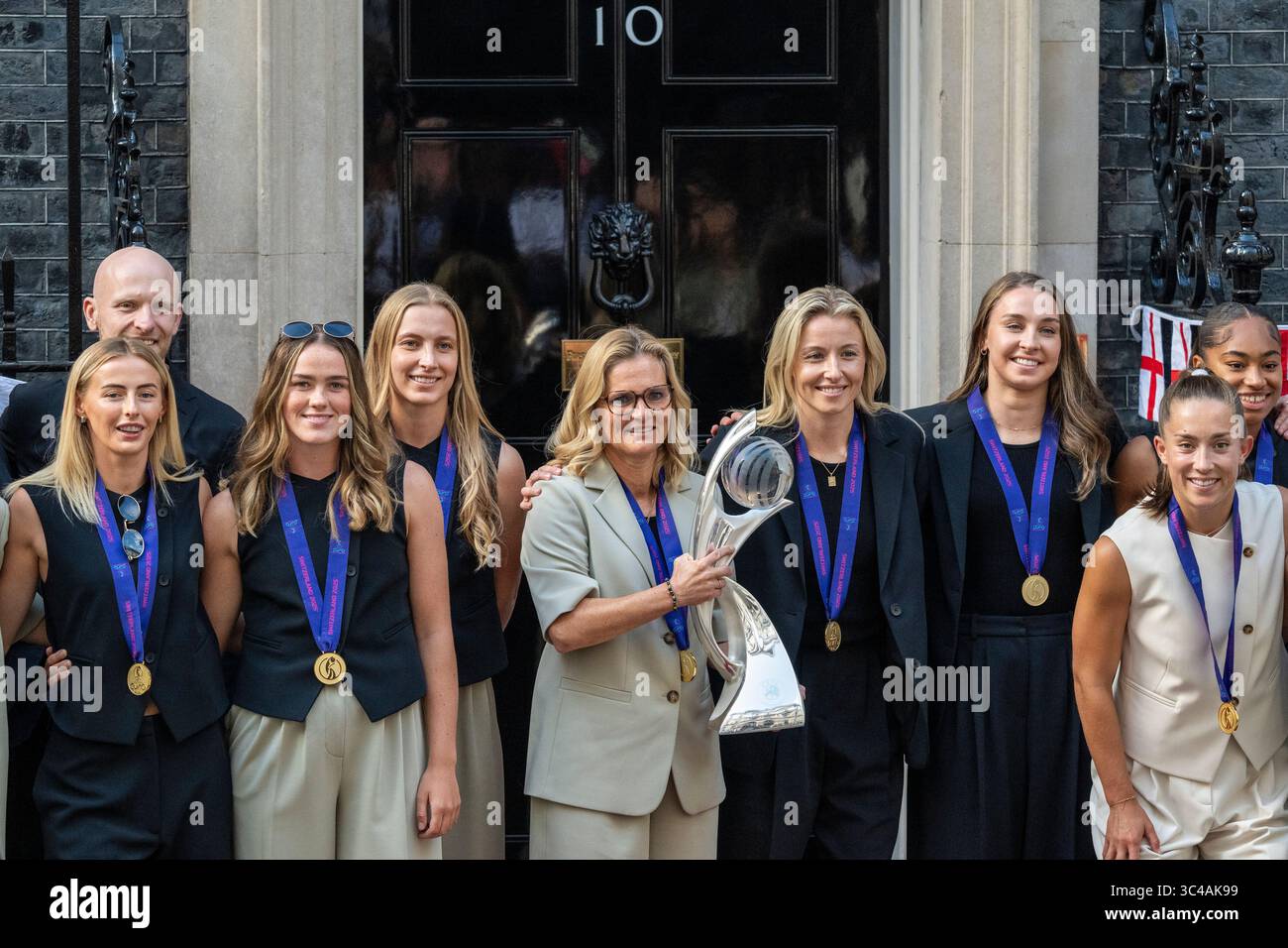 London, UK. 28 July 2025. (L) Chloe Kelly, (C) Sarina Wiegman with the ...