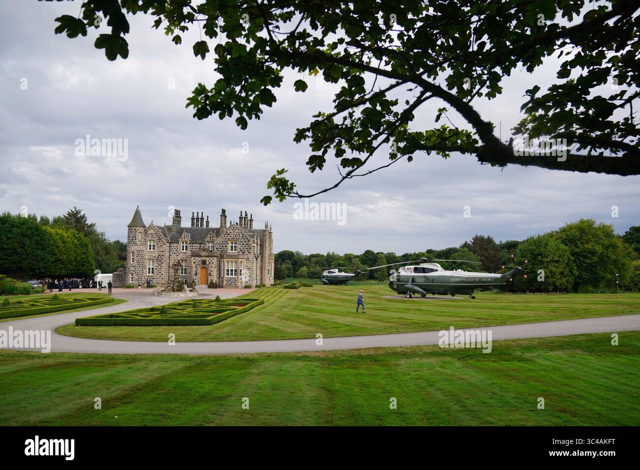 Marine One and Marine Two are parked on the lawns outside MacLeod House ...