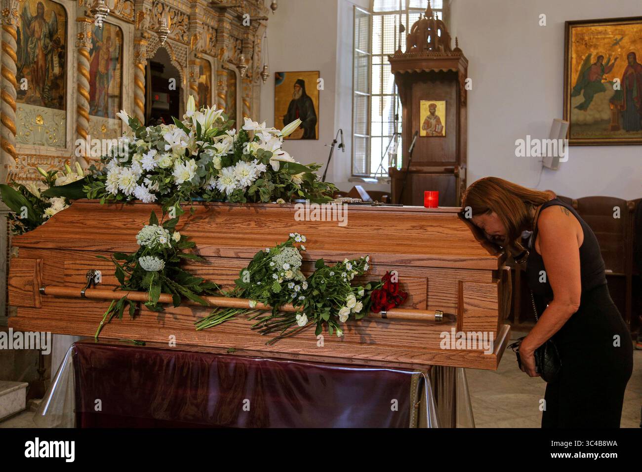 July 28, 2025, Bikfaya, Bikfaya, Lebanon: People mourn over the coffin ...