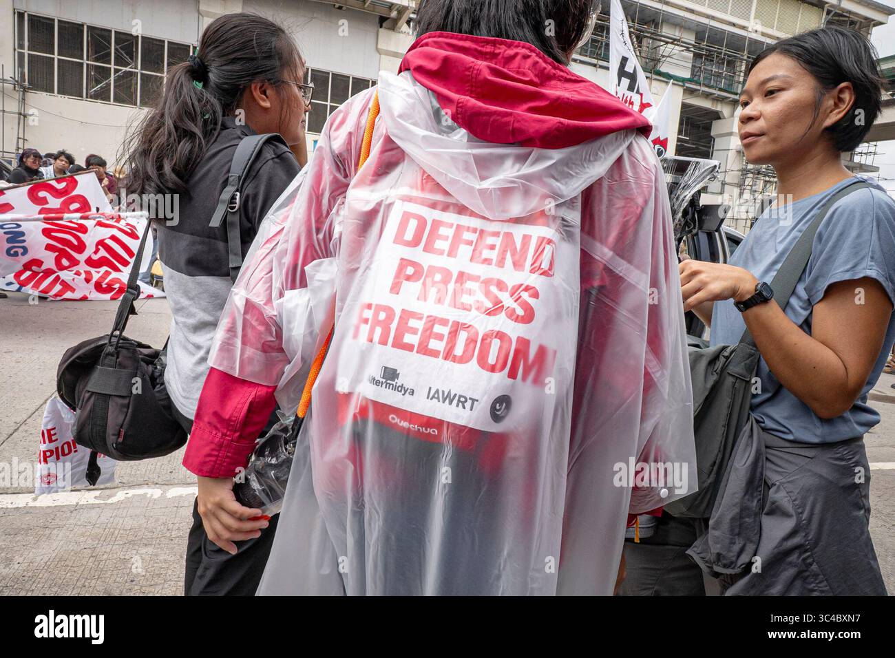 Manila, Manila, Philippines. 28th July, 2025. A photographer wears a ...