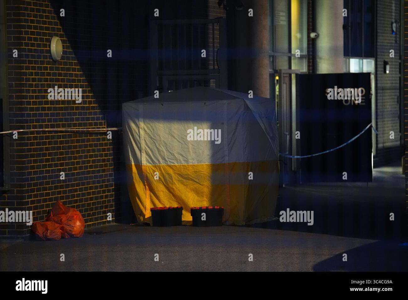 A police forensic tent at the scene in Long Lane, Southwark, south ...