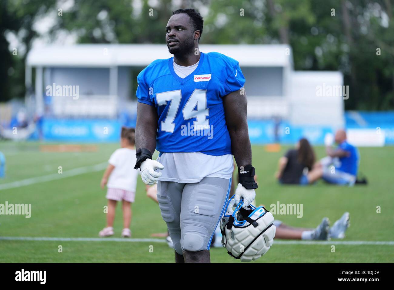 Detroit Lions guard Kayode Awosika walks off the field after an NFL ...