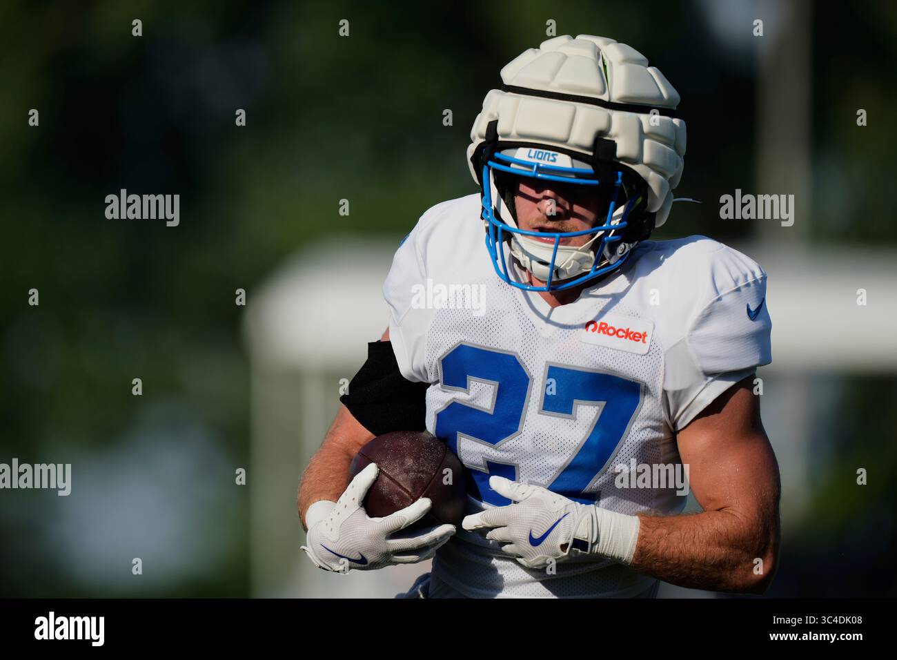 Detroit Lions safety Ian Kennelly runs drills during an NFL football ...