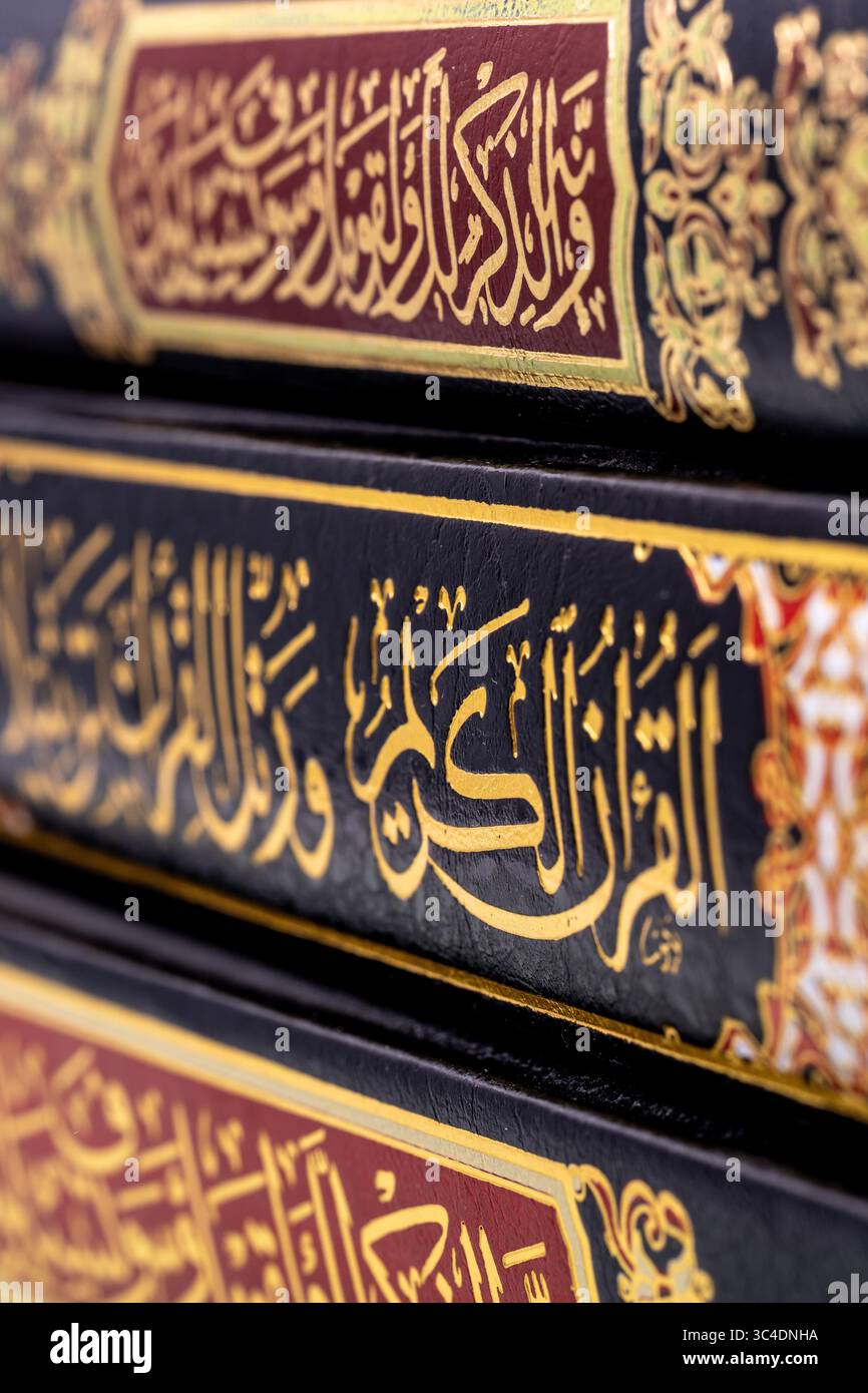 Close-Up of Holy Quran Covers with Elegant Arabic Calligraphy Stock ...