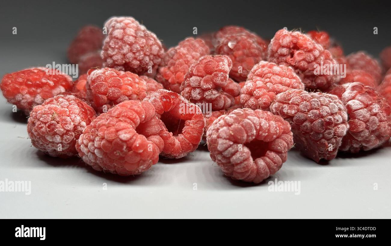 Ripe frozen raspberries close hi-res stock photography and images - Alamy