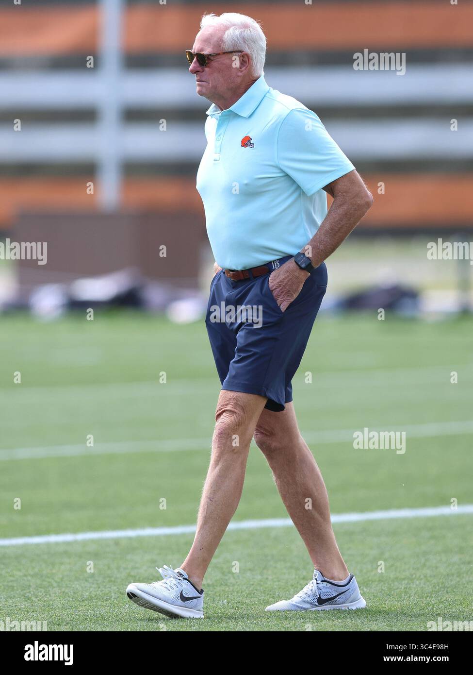 Cleveland Browns owner Jimmy Haslam walks the field during training ...
