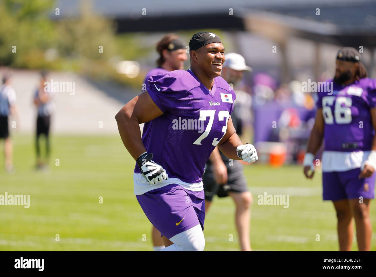 Minnesota Vikings tackle Walter Rouse (73) runs drills during the team ...