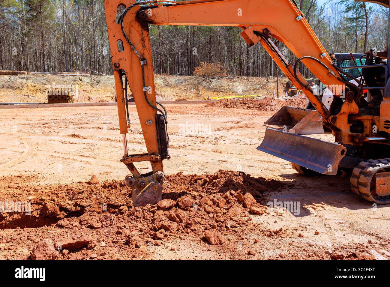 Construction works soil removal excavator hi-res stock photography and ...