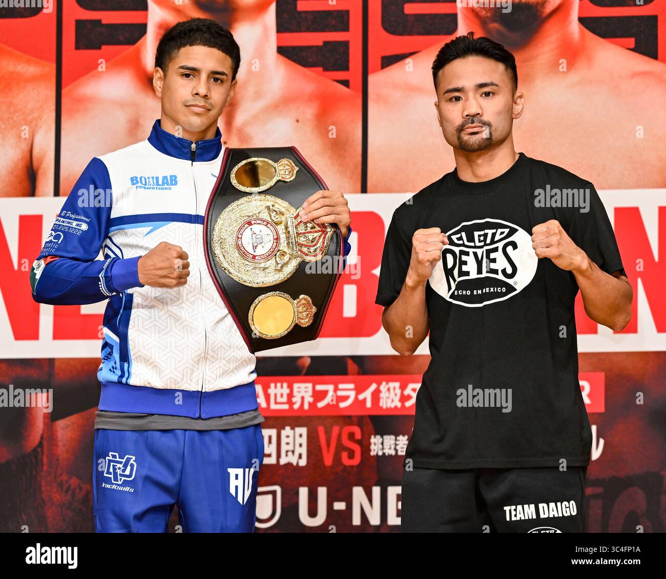 WBA bantamweight champion Antonio Vargas (L) of US and Daigo Higa of Japan pose for a photo ...