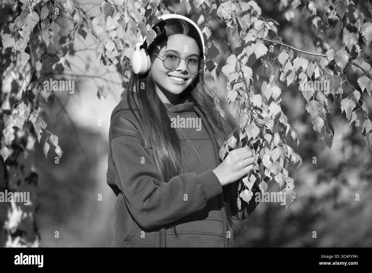 girl in music headphones outdoor. Hello fall. autumnal fall colors ...