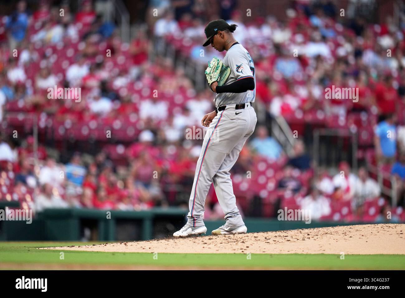 Miami Marlins starting pitcher Edward Cabrera kicks at the dirt after ...