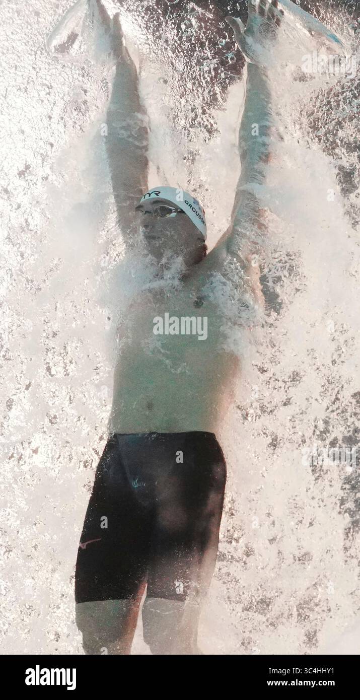 GROUSSET Maxime of France competes during the men's swimming 50 meters ...
