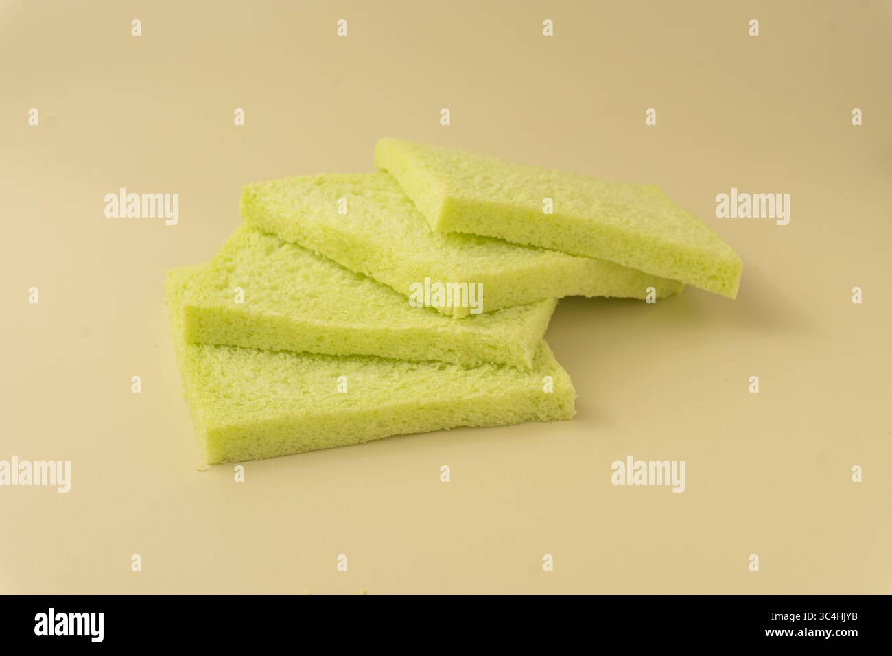 Soft pandan flavored white bread without crust, featuring a smooth ...