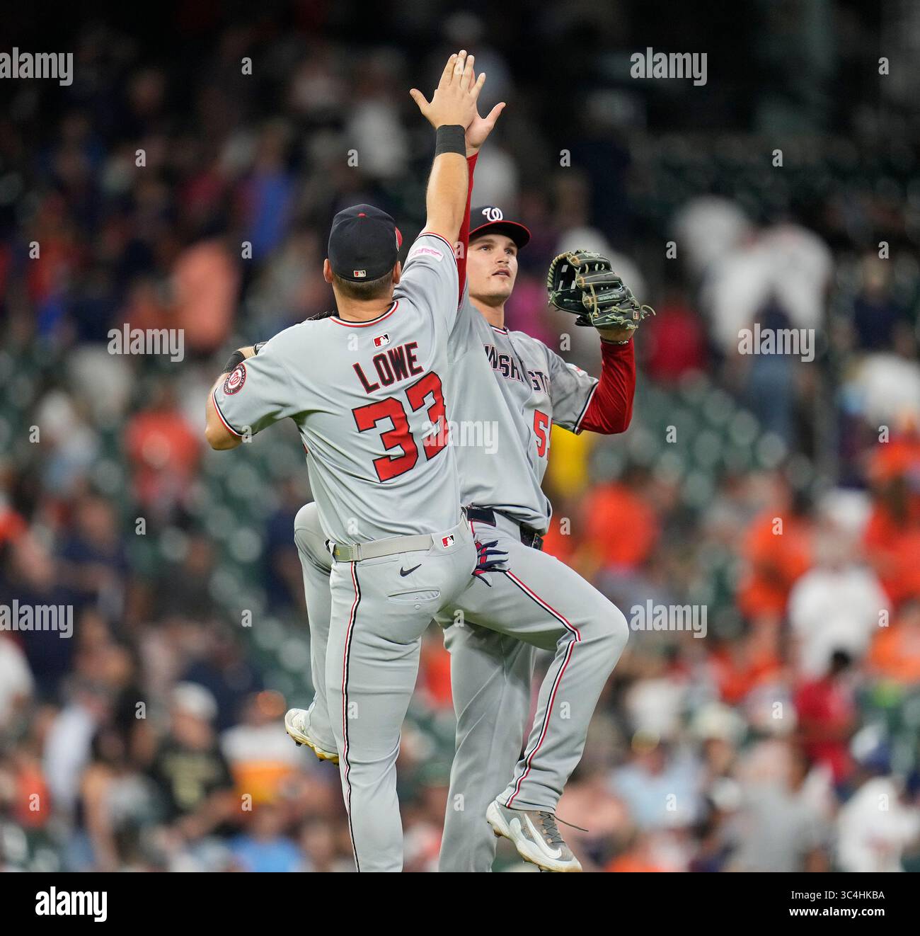 Washington Nationals' Nathaniel Lowe (33), and Brady House, right ...