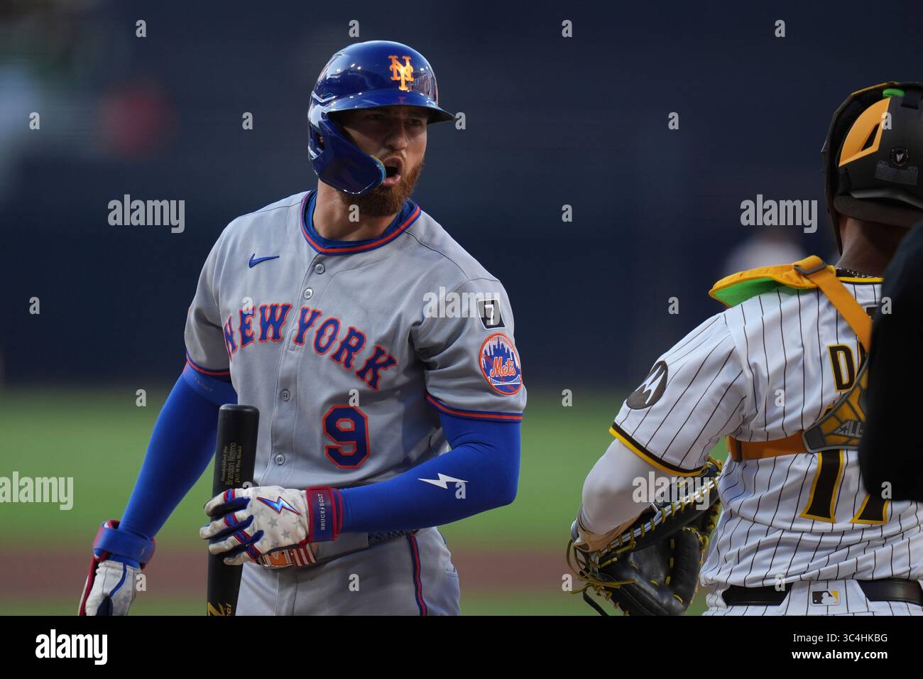 New York Mets' Brandon Nimmo talks with home plate umpire Emil Jimenez ...