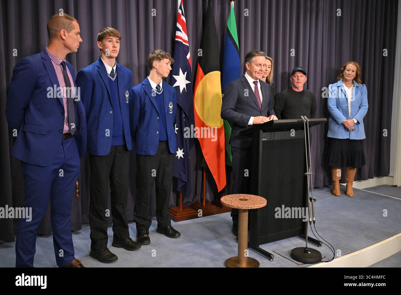 Minister for Health Mark Butler with teachers and students at a press ...
